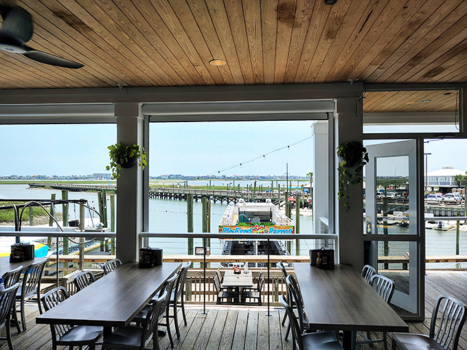 Dining with a view that rivals the food&mdash;expansive windows frame the marshland and docks, nature's perfect backdrop for seafood feasting.
