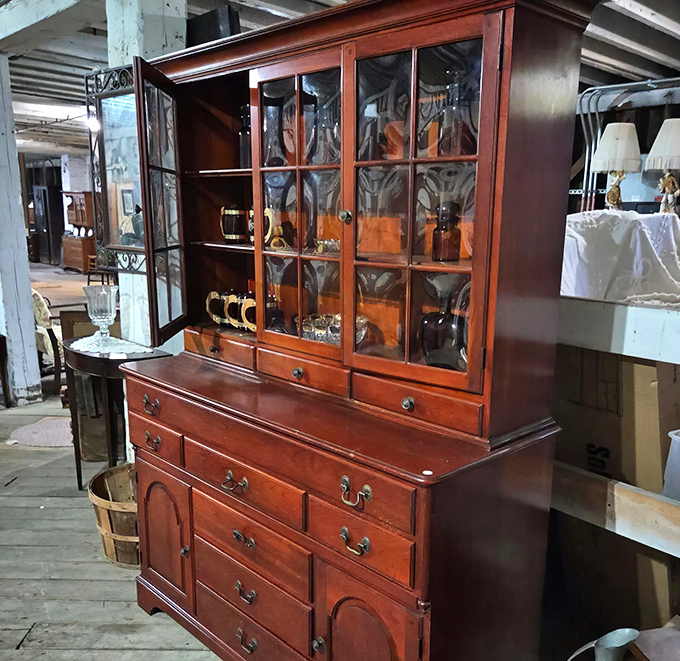 Glass-front elegance displaying treasures that would make any episode of Antiques Roadshow worth watching.