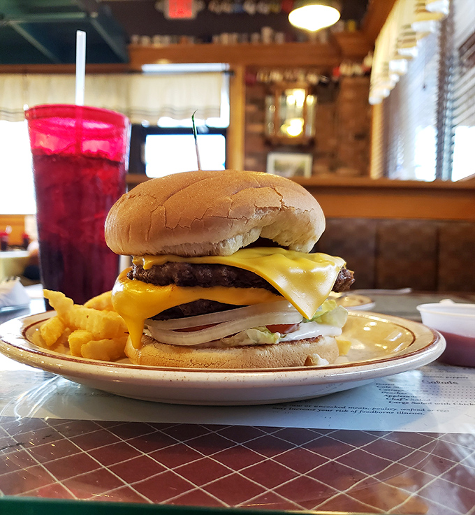 This double cheeseburger towers like a delicious skyscraper, proving lunch can be just as impressive as breakfast.