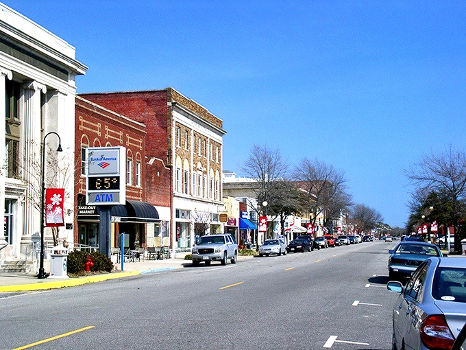 Sunlight dancing on brick facades creates a warm glow that perfectly captures why small-town America continues to hold such a powerful place in our collective heart.