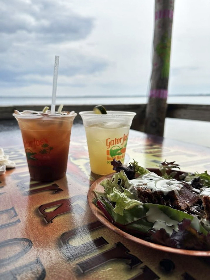 Lakeside sipping at its finest – cold drinks with a side of water views that Instagram filters couldn't improve if they tried.