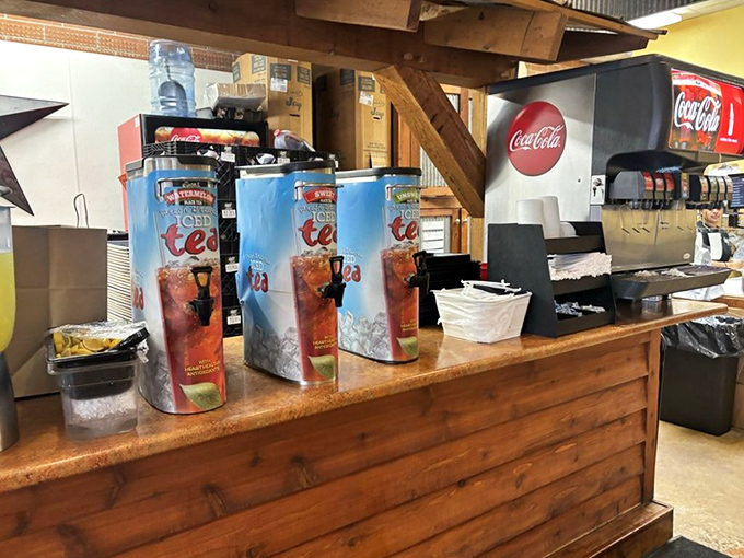 Sweet tea dispensers standing at attention like soldiers guarding the most precious resource in the South. Hydration with purpose.