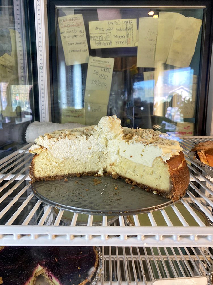 Cheesecake in a display case is like Cinderella waiting for her prince—patient, perfect, and destined for a magical ending.
