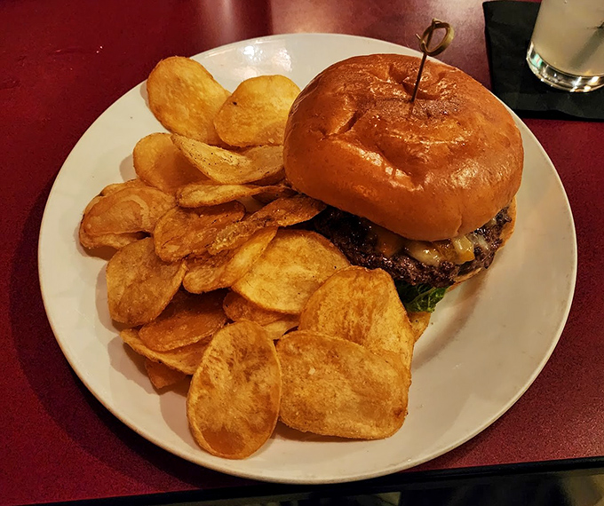 This burger isn't just dinner&mdash;it's an event, with house-made chips standing guard around a brioche bun that's practically begging to be Instagram famous.