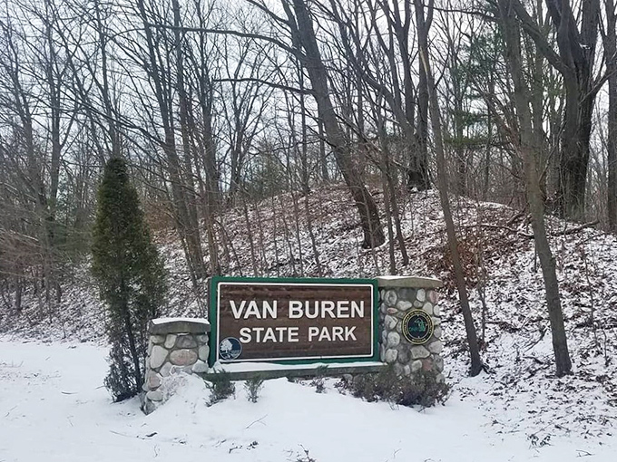 Winter's quiet transformation: Even beneath a blanket of snow, Van Buren State Park's entrance sign promises adventures waiting to be discovered.