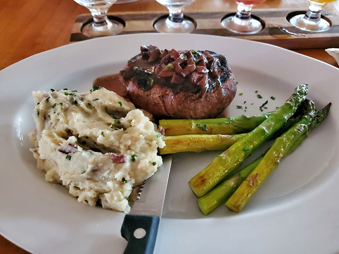 Steak and mashed potatoes: proving that sometimes the classics endure for good reason. Those asparagus spears add just the right touch of green.