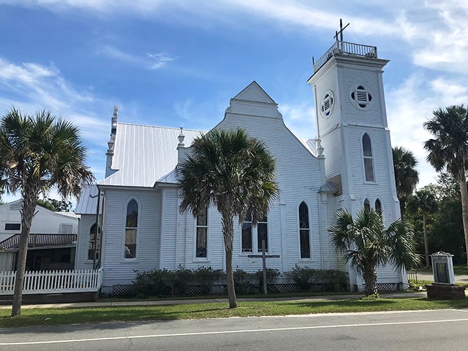 The white wooden First Methodist Church, with its soaring steeple, has witnessed generations of Apalachicola life unfold beneath swaying palms.