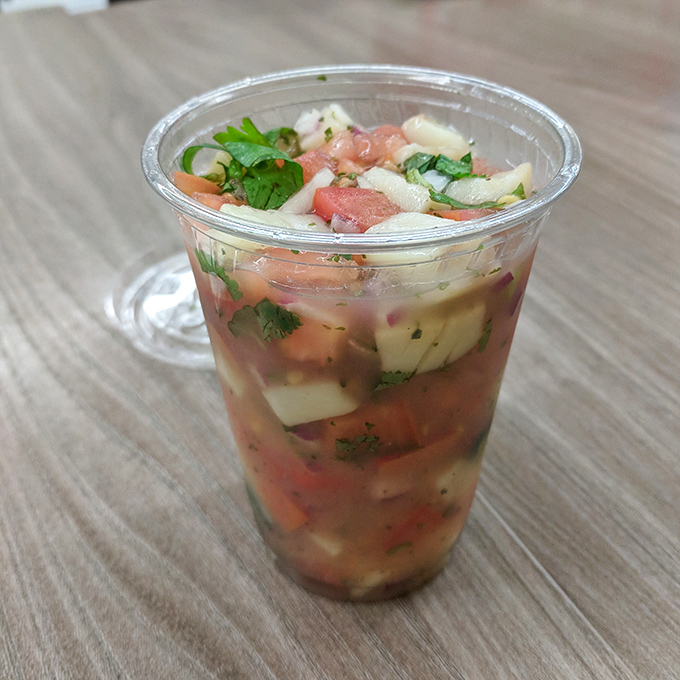 This fish ceviche cup is summer in liquid form &ndash; bright, citrusy, and refreshing enough to make you forget you're standing on a city sidewalk.