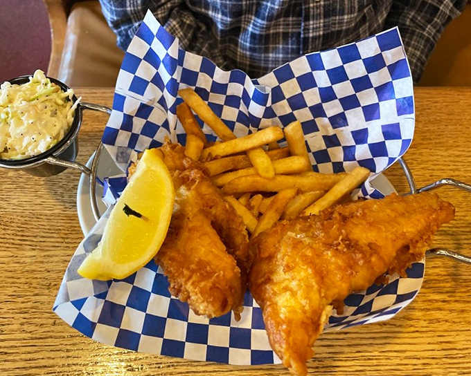 Fish and chips served in a checkered basket&mdash;the universal signal that you're about to experience something gloriously unpretentious and deeply satisfying.