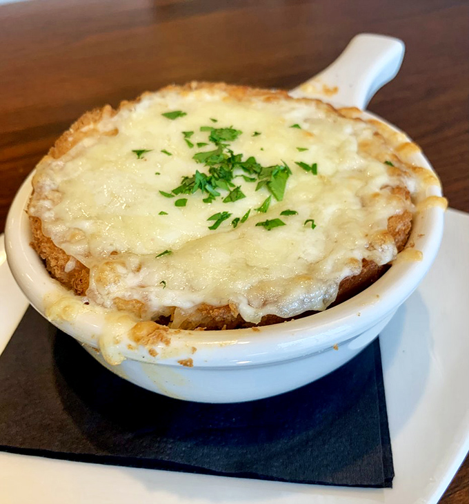 French onion soup that's had a makeover&mdash;the cheese pull potential here could win Olympic medals for both distance and style.