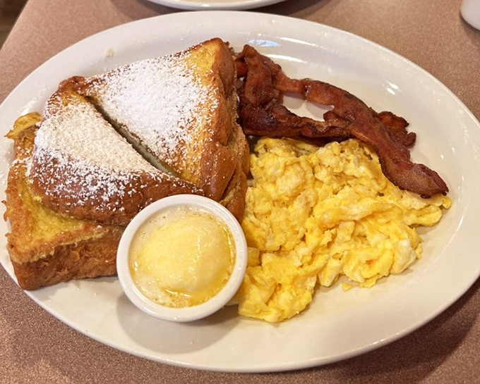 French toast that's had a spa treatment&mdash;golden, fluffy, and dusted with powdered sugar like the first perfect snowfall of winter.