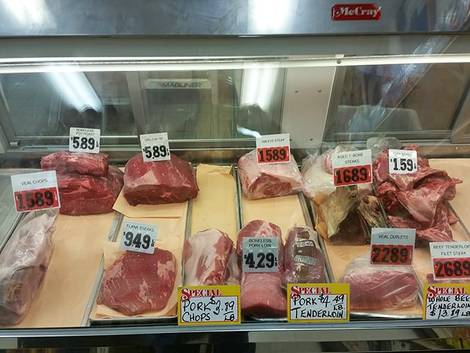 A butcher case that would make any carnivore weep with joy. These aren't just cuts of meat; they're possibilities waiting to happen.