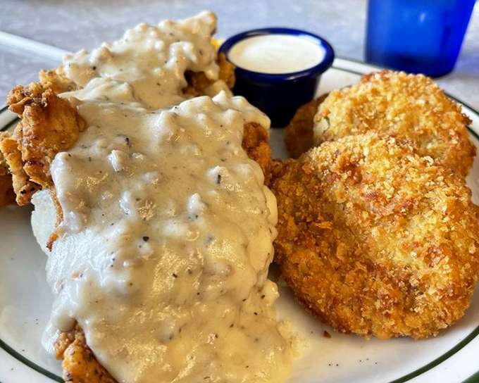 The Comfy Chicken Biscuit lives up to its name, smothered in gravy with a side of golden-fried goodness. Comfort food that hugs you from the inside.