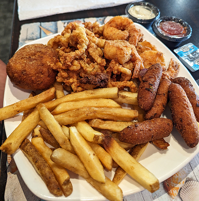 The fried seafood platter that answers the eternal question: "Why choose one when you can have it all?"