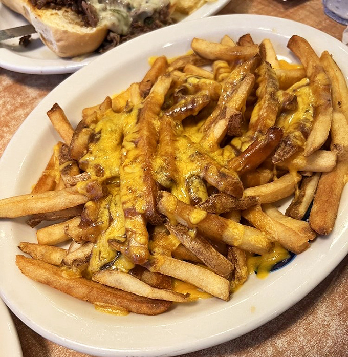 These cheese-smothered fries aren't just a side dish&mdash;they're the main event's scene-stealing sidekick. Crispy, golden, and unapologetically indulgent.