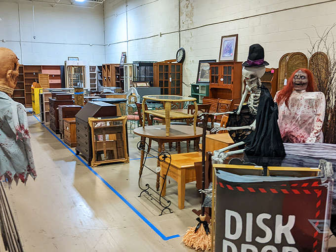 Halloween meets home d&eacute;cor in this furniture section. Those skeleton greeters aren't included in the price, but they certainly add character.