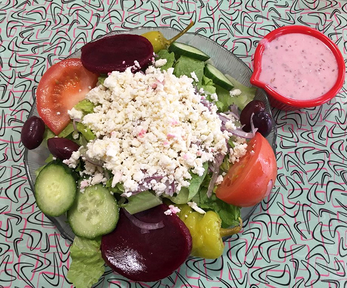 A Greek salad that brings Mediterranean sunshine to Michigan&mdash;bright, fresh, and topped with enough feta to make Zeus himself nod in approval.
