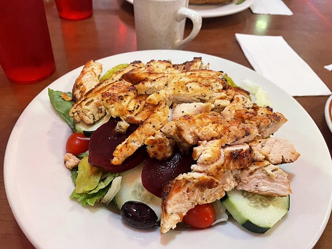 A grilled chicken salad that doesn't apologize for being healthy &ndash; vibrant, fresh, and substantial enough to satisfy even dedicated carnivores.