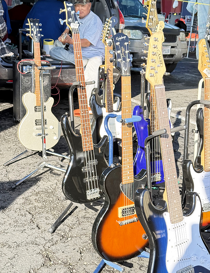 Guitar gallery that would make Eric Clapton do a double-take&mdash;each instrument waiting for its chance to star in someone's garage band dreams.