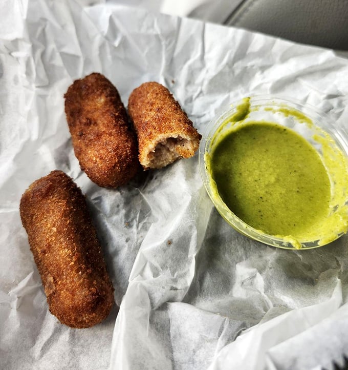 Ham croquettes: crispy on the outside, creamy on the inside, and gone in sixty seconds. That green sauce is begging to be dunked into.