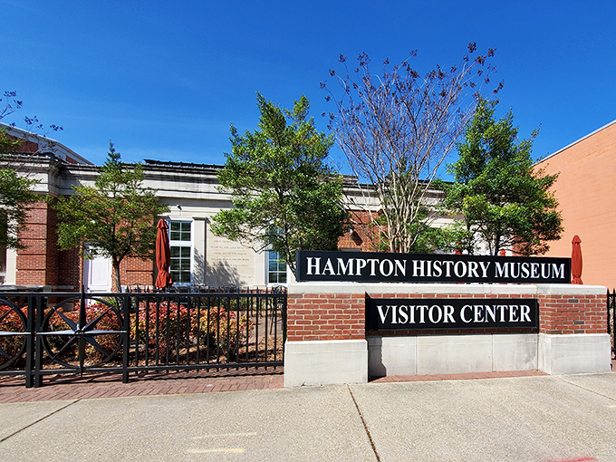 The Hampton History Museum welcomes curious minds with brick-lined charm and stories spanning four centuries of coastal Virginia life.