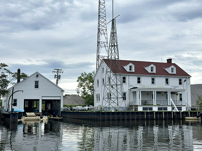 Waterfront buildings tell stories of commerce and community, their weathered facades reflecting generations of harbor life and maritime trade.