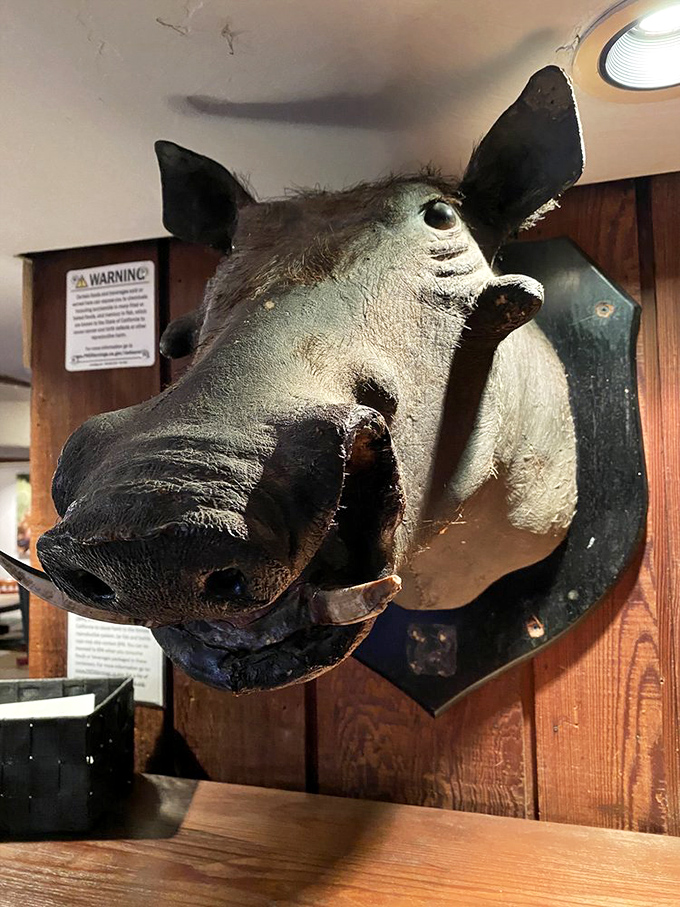 The restaurant's namesake watches over diners with a permanent expression that seems to say, "You're definitely ordering dessert, right?"