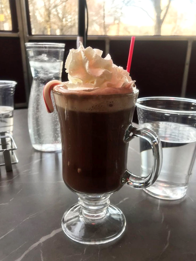 When Chicago winters bite, this hot chocolate bites back &ndash; topped with a cloud of whipped cream and a candy cane for good measure.