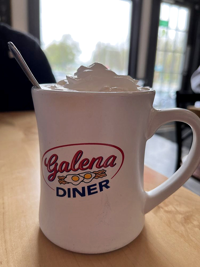 Their hot chocolate isn't just a drink, it's a warm hug in a branded mug, topped with a cloud of whipped cream.