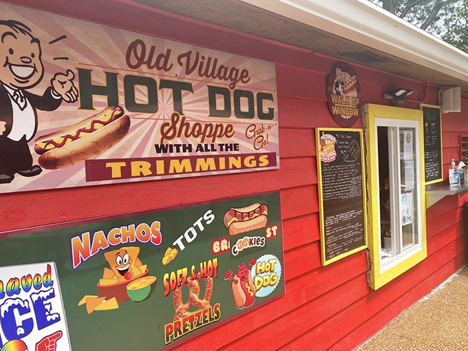 The Hot Dog Shoppe's vibrant red exterior promises comfort food that requires extra napkins. Calories don't count when they're consumed with this much joy!