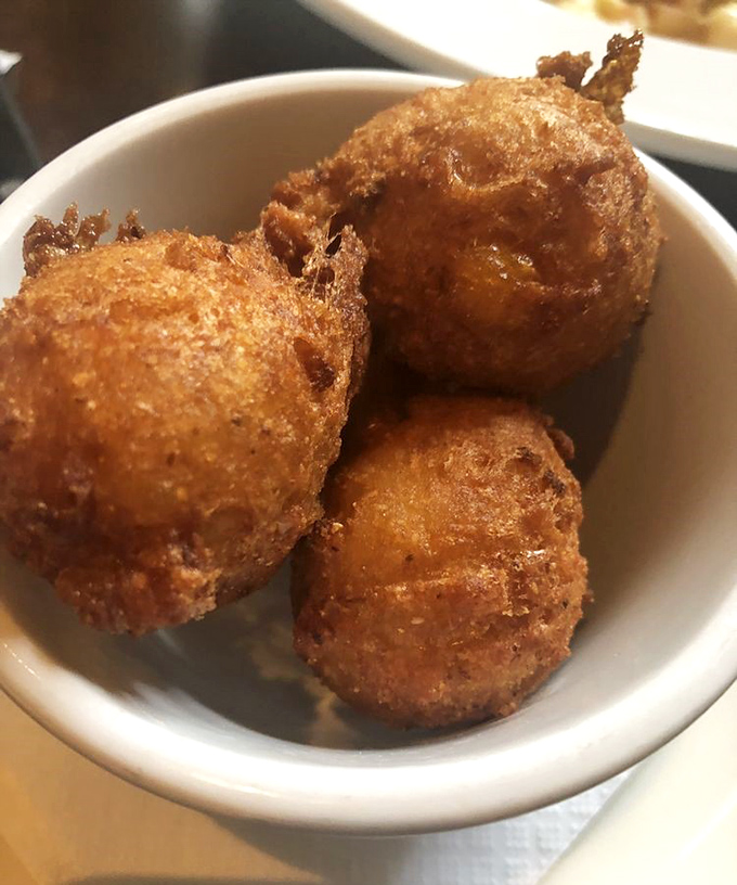 Hush puppies so perfectly golden and crisp, they're the unsung heroes of Southern cuisine—small but mighty flavor bombs.