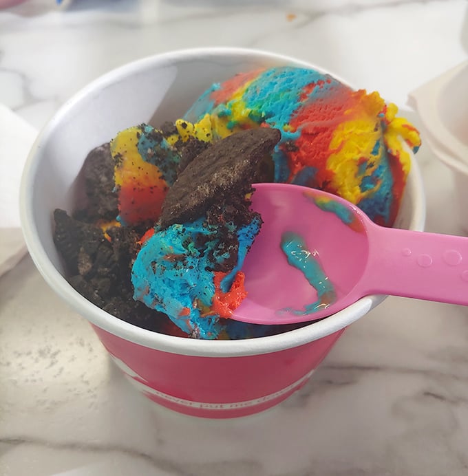 Rainbow ice cream that looks like a unicorn's dream sequence. Childhood nostalgia in every technicolor spoonful. 