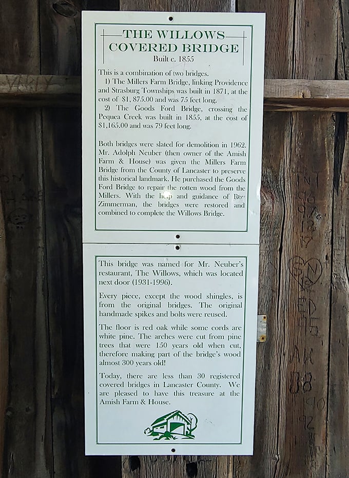 The bridge's story revealed: this informational plaque shares fascinating details about the structure's origins and remarkable preservation journey.