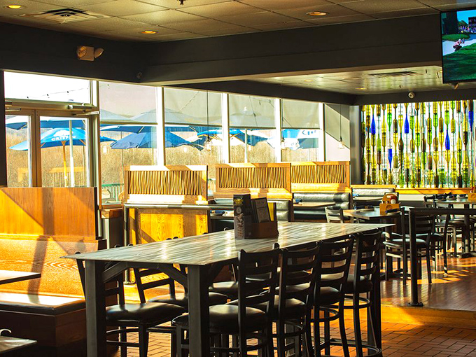 Sunlight streams through windows, turning an ordinary lunch into a mood-lifting experience. The booth seating practically whispers "stay awhile."