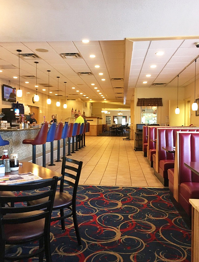 The counter seats and booths create that perfect diner ecosystem where regulars and newcomers coexist in breakfast harmony.
