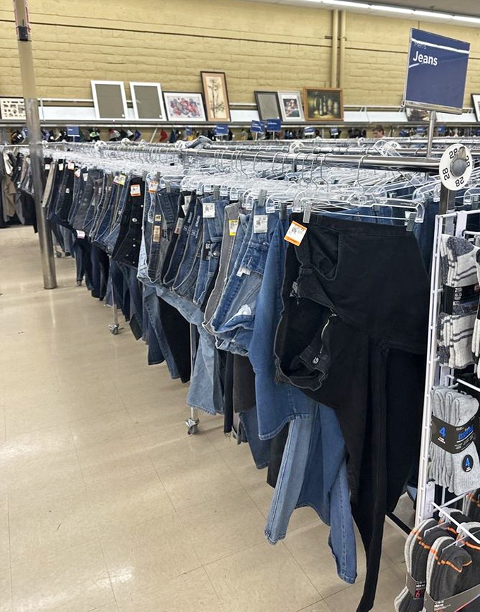 Denim heaven or jean therapy? This rack offers more blue options than a paint store, each pair with its own mysterious backstory.