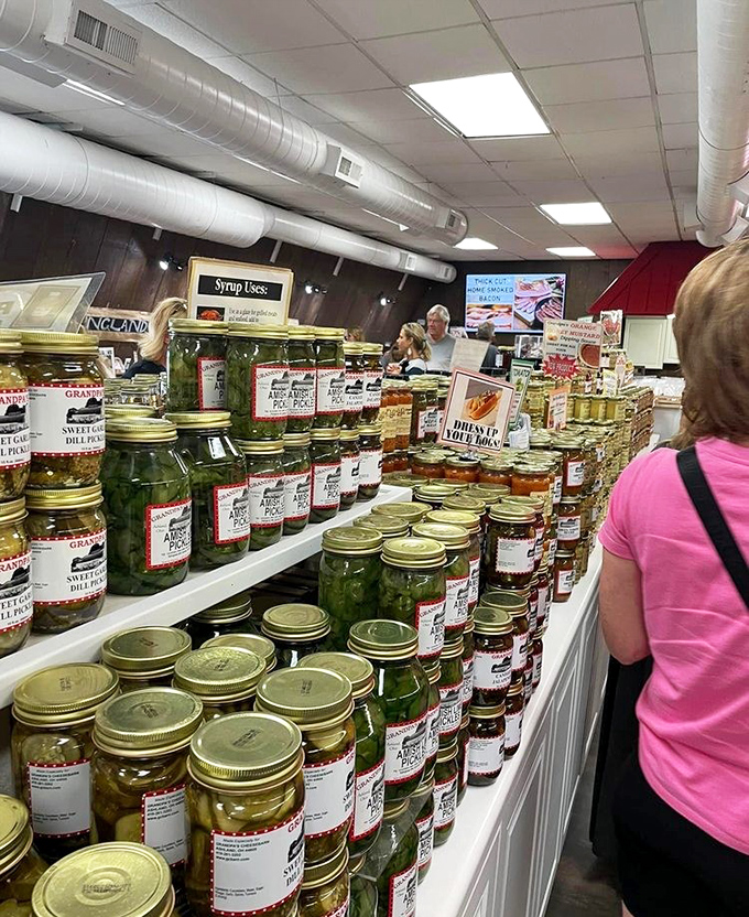 Pickle jars stacked with military precision&mdash;a glistening green army ready to deploy tangy crunch to sandwiches across Ohio.