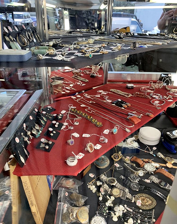 Treasure hunting at its finest—jewelry cases filled with everything from costume pieces to the occasional genuine gem hiding in plain sight.