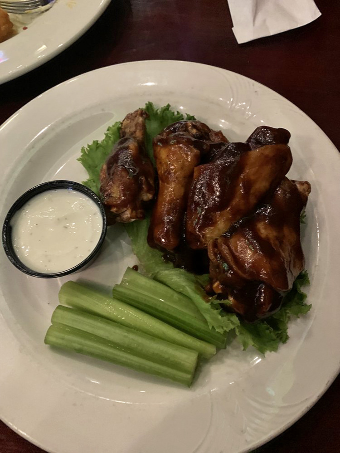 Kentucky bourbon wings with a glaze so good, they should probably come with their own warning label.