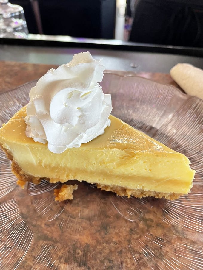 Key lime pie so authentic, it should come with its own passport from the Florida Keys. That whipped cream cloud is just showing off.
