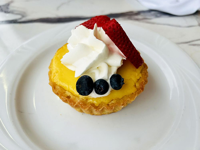 This lemon tart is sunshine on a plate. The perfect balance of sweet and tart, like finding the ideal comeback&mdash;but much more delicious.