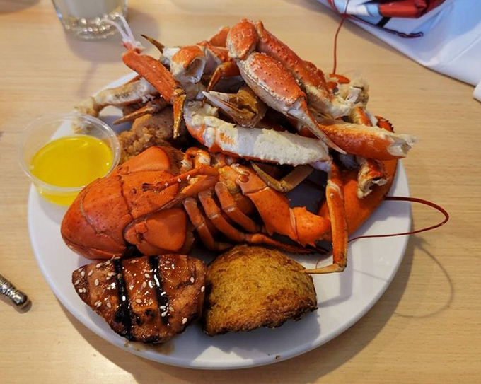 Lobster shell fragments scattered like evidence of a delicious crime scene &ndash; the butter cup stands as the only witness.