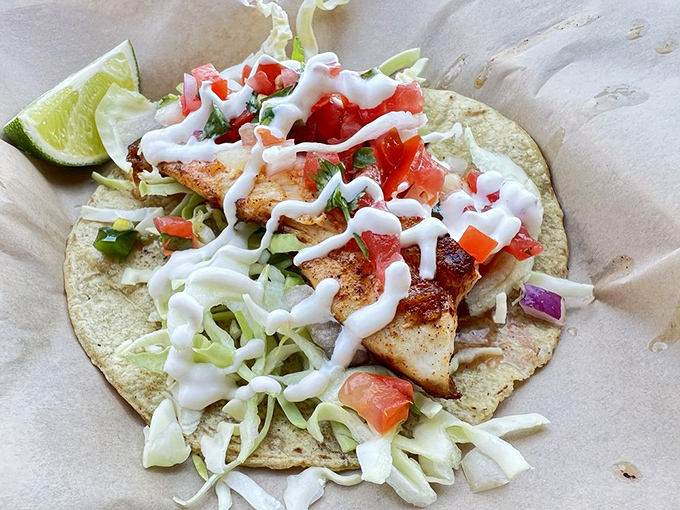 A fish taco that deserves its own sonnet. Flaky fish, crunchy cabbage, and that sauce&mdash;oh, that sauce&mdash;creating perfect harmony in every bite.