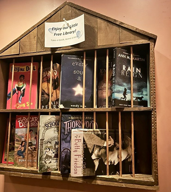 A little free library inside a restaurant? Pure genius. Browse for your next read while waiting for your black truffle risotto.