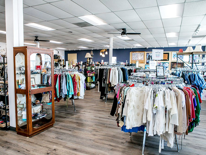 The main clothing area stretches invitingly through the store, with circular racks creating a wonderland of fashion possibilities at fraction-of-retail prices.