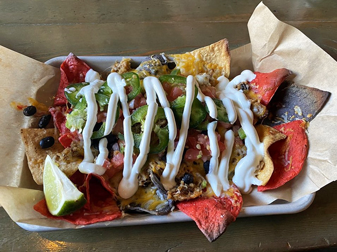 These nachos don't mess around &ndash; loaded with all the right stuff and drizzled with sauce that makes every chip worth fighting for.