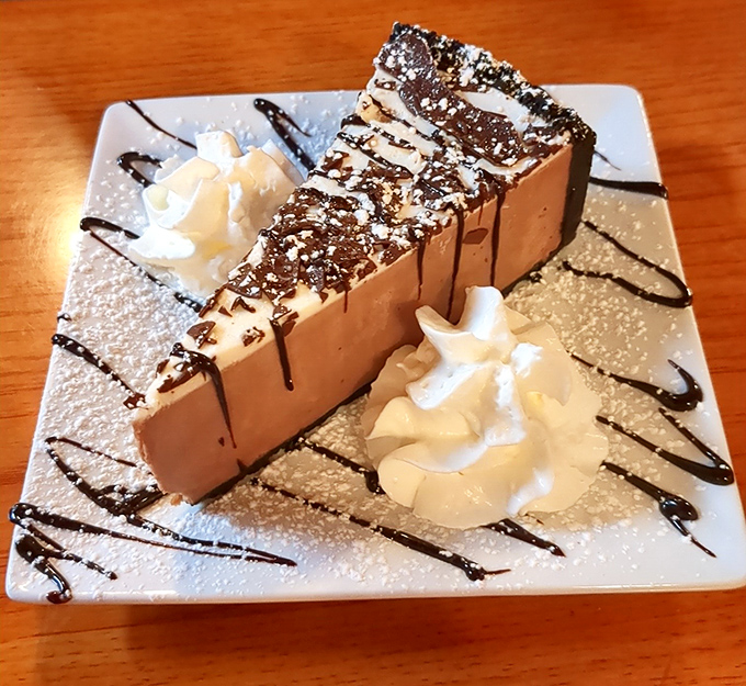 This isn't just dessert; it's a chocolate intervention. The whipped cream is there to cushion your fall into sweet oblivion.