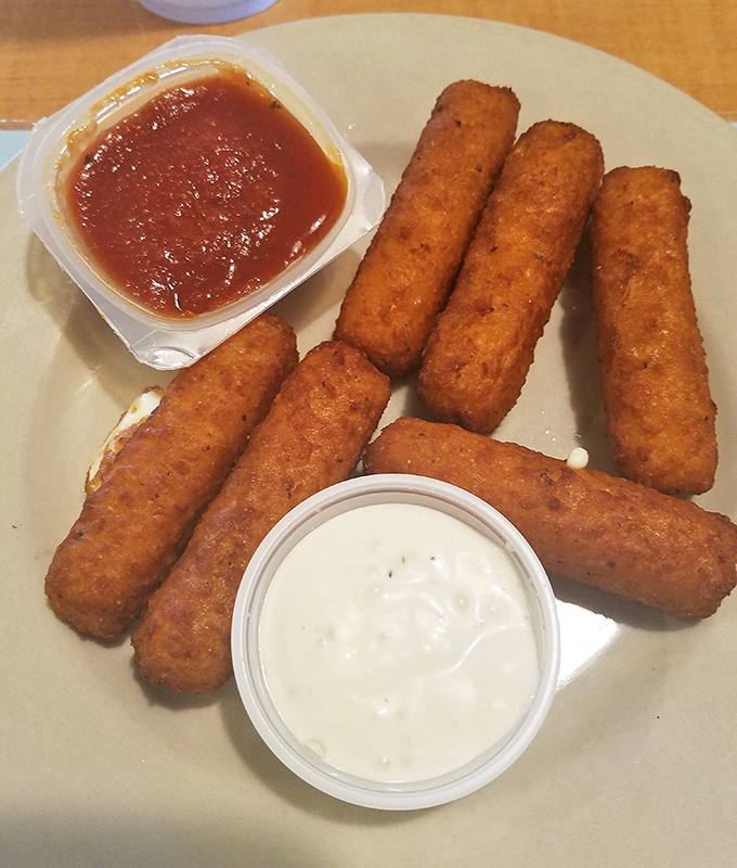 Mozzarella sticks: the diplomatic ambassadors between appetizer and comfort food nations. Two dipping sauces because important decisions shouldn't be forced upon hungry people.