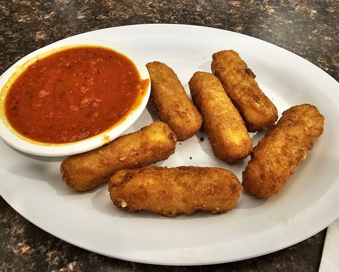Mozzarella sticks with that perfect pull &ndash; the cheese stretches so dramatically it deserves its own soap opera. The marinara sauce is just the co-star.