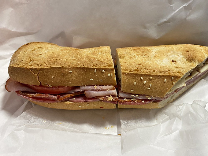 This sandwich isn't playing around&mdash;layers of meat and cheese creating the architectural marvel that lunch dreams are made of.